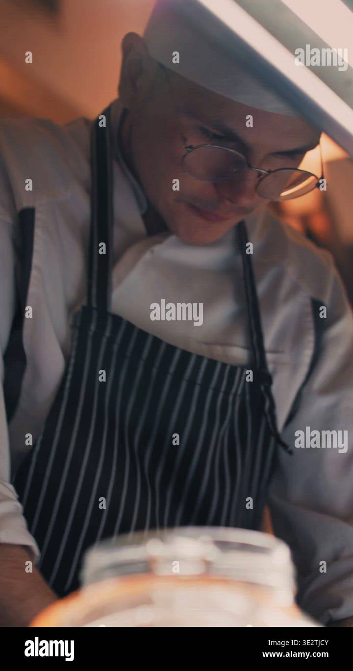 Cook working hard at commercial kitchen Stock Video Footage - Alamy