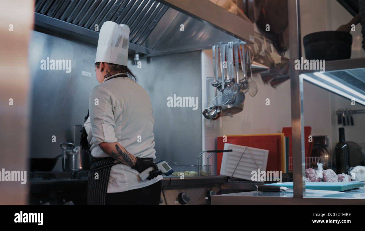 Colleague coming to tell a joke to chef Stock Video Footage - Alamy