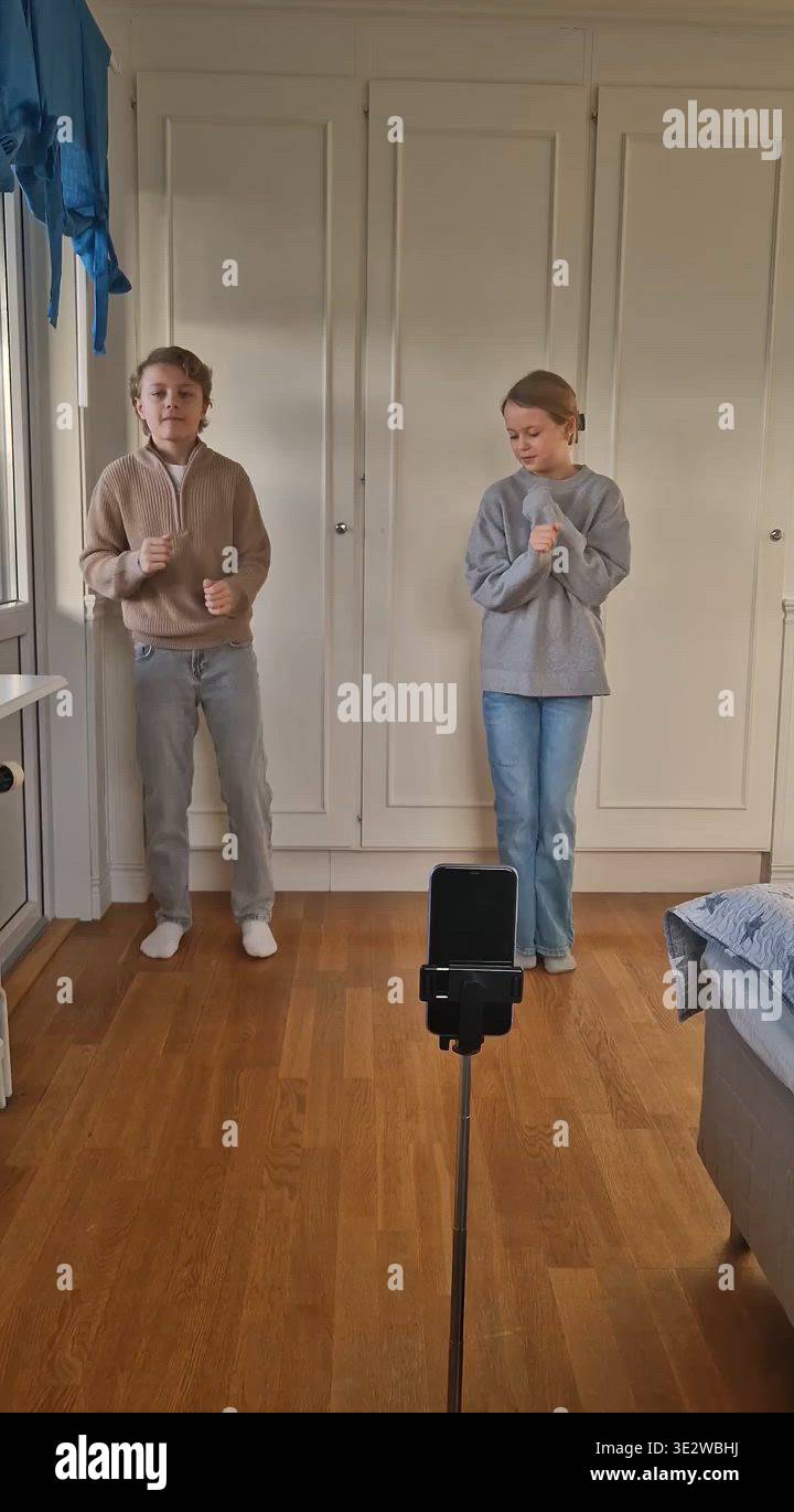 Children Recording a Dance Video for Social Media in Bedroom Stock ...