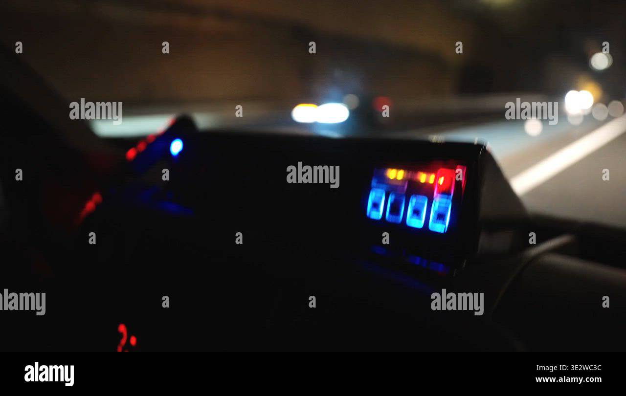 Ambulance dashboard lights flashing at night Stock Video Footage - Alamy