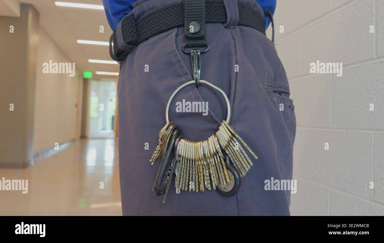 Key Chain on Security Guard Stock Video Footage - Alamy