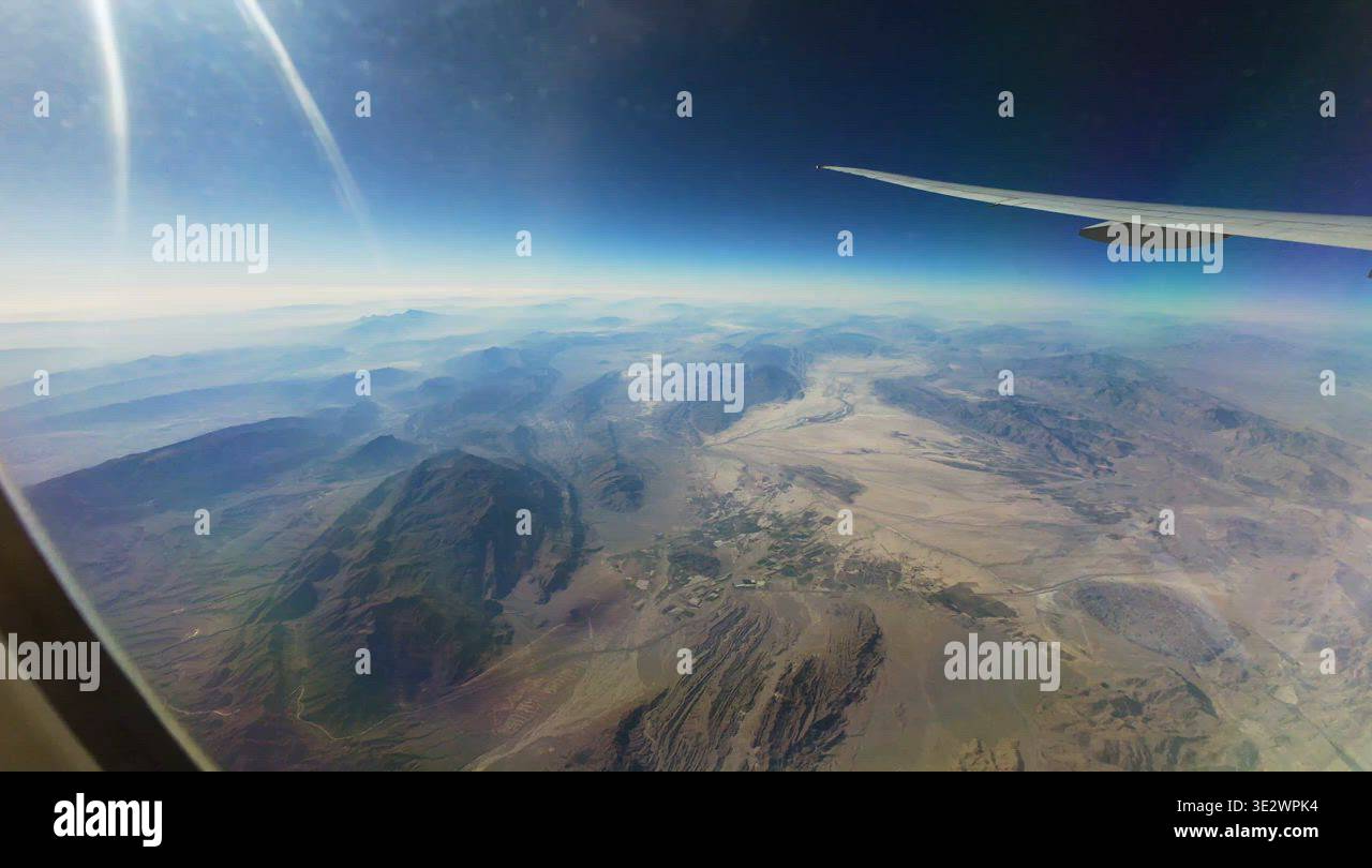 Mountain view from airplane window Stock Video Footage - Alamy