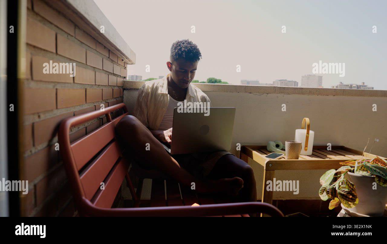 man working remotely on his laptop Stock Video Footage - Alamy