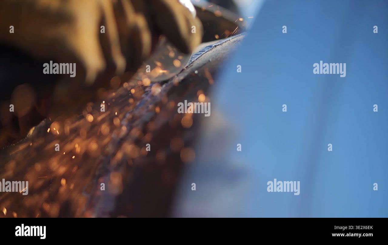 Grinding weld seam on industrial pipeline Stock Video Footage - Alamy