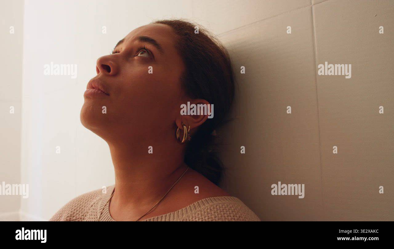 Upset woman crying in bathroom Stock Video Footage - Alamy