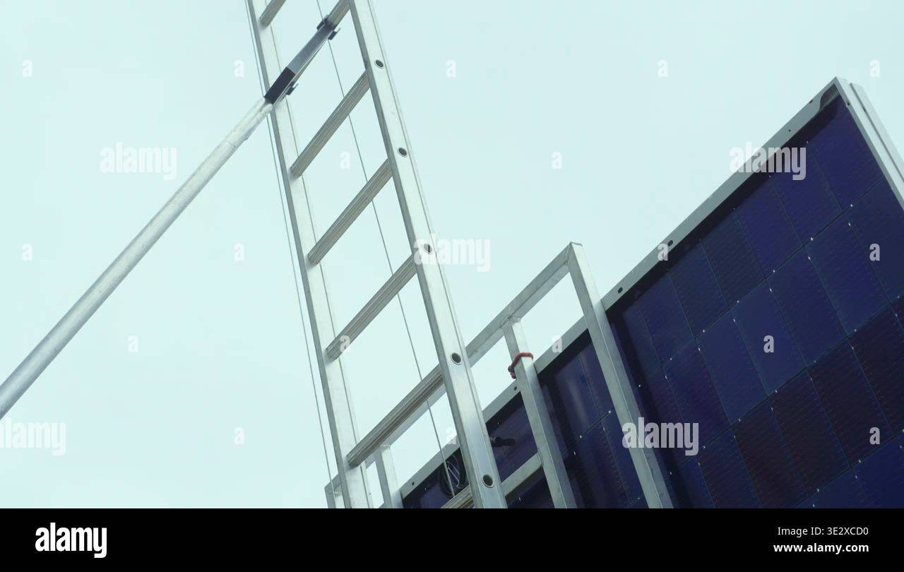 Photovoltaic solar panels installation using ladder lift Stock Video ...