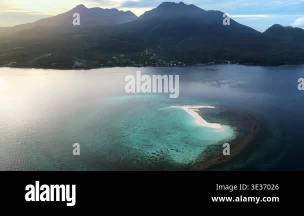 Aerial drone view of a curved sandbar in Coron Bay, Palawan ...