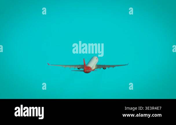 Aircraft departing into clear turquoise sky with engines roaring ...