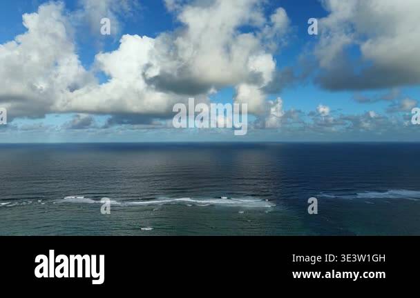 Scenic aerial drone video of the island of Rodrigues coast. Fishermen ...