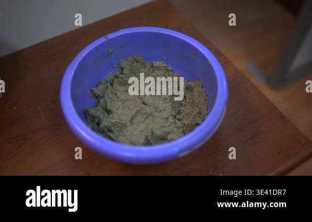 Blue Bowl With Wet Clay On Wooden Table, Coarse Gray Clay Mixture In ...