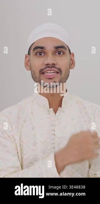 Vertical Video of Muslim Man Talking to Camera Stock Video Footage - Alamy