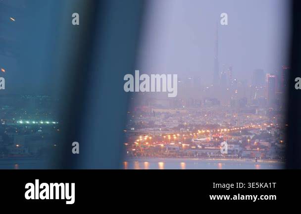 Cinematic night-to-day timelapse of the Dubai skyline. Captured from a ...