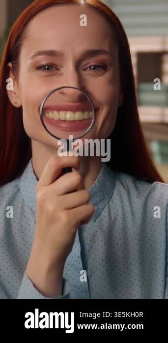 Happy Caucasian business woman holding magnifying glass face smiling ...