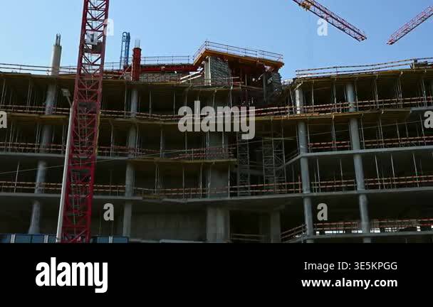 A detailed view of a multi-story reinforced concrete building frame ...