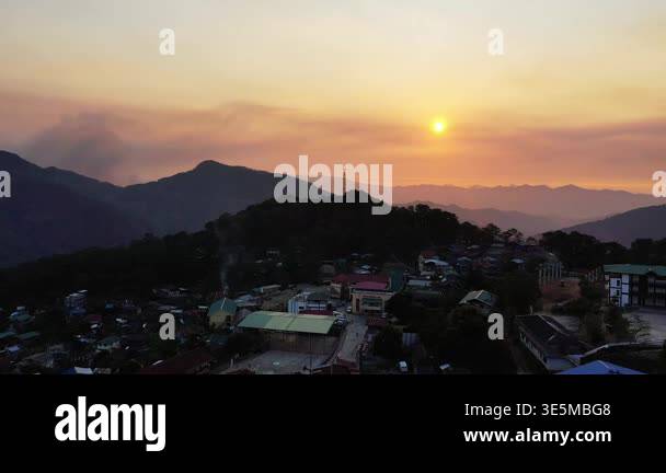 Aerial view of Sagada village nestled among pine covered mountains at ...