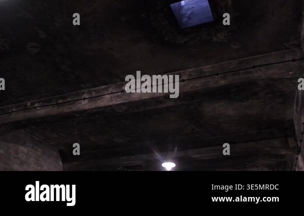 Scary empty concrete room in a deserted basement revealed by tilting ...