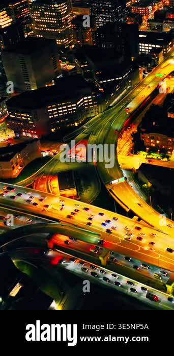 Multiple highway ramps and freeway intersections with yellow street ...