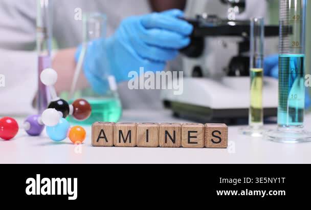 Wooden cubes form word Amines indicating chemical substance under ...