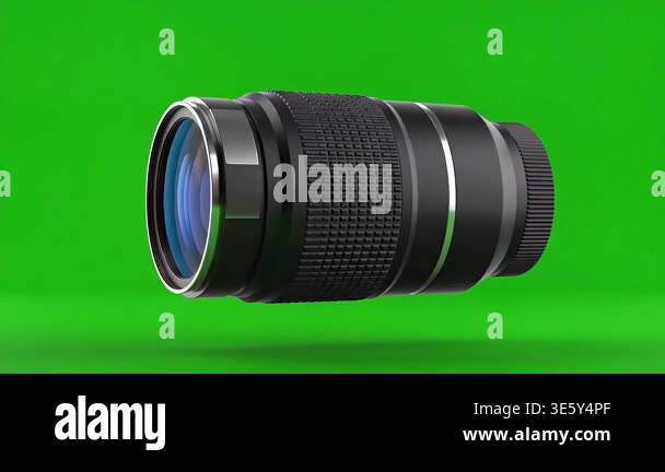 A professional camera lens is isolated on a vibrant green screen ...