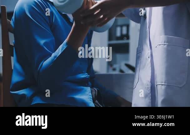 close up of male doctor in medical uniform and gloves checking patient ...