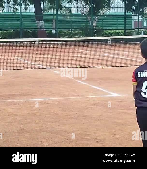 Delhi, India, February 17, 2025 - Junior tennis players having coaching ...