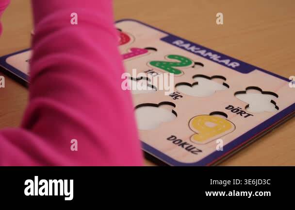 girl plays the game of the alphabet Stock Video Footage - Alamy