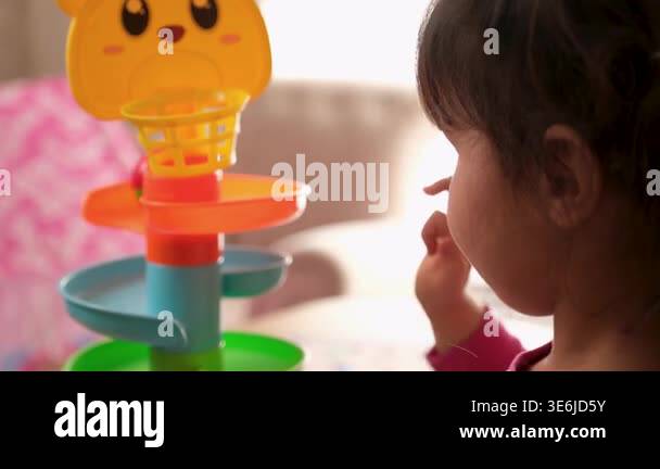close - up portrait of little girl holding toy Stock Video Footage - Alamy