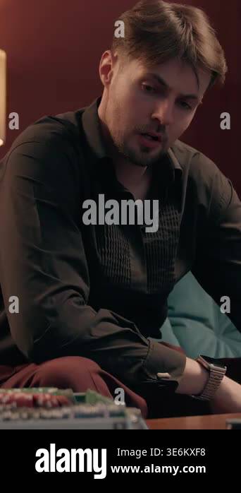 Sad pensive Caucasian drunk man male guy player gamer smoking cigar ...