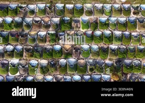 Aerial shot of Chinese graves at Ulu Choh showing clustered tombstones ...