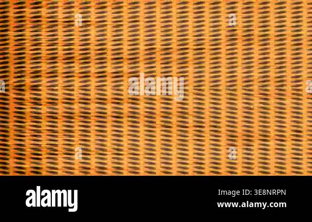 Close-up of a red and black woven texture, creating an abstract and ...