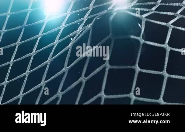 Super Slow Motion Hockey Goal on Black Background. Puck Hitting Net at ...