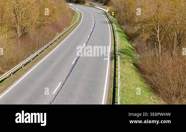 Cars are driving on the road outside the city. High quality FullHD ...