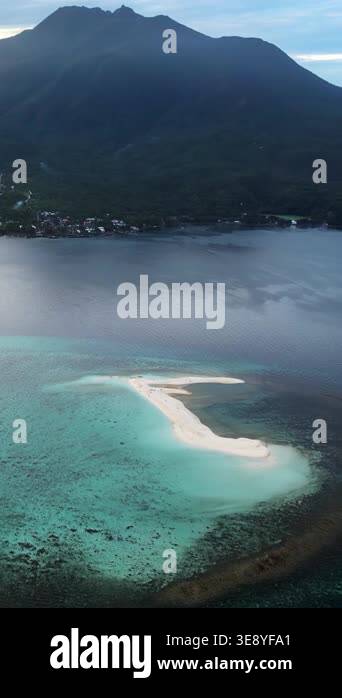 Aerial drone view of a curved sandbar in Coron Bay, Palawan ...