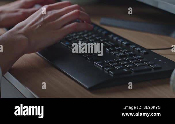 Close up of hands typing on keyboard in home office. Concept of remote ...