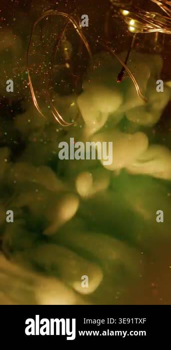 Vertical video. Fume explosion. Art fog. Broken glass bokeh light bulb ...