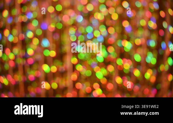 Colorful glitter lights softly sparkle with rainbow reflections ...