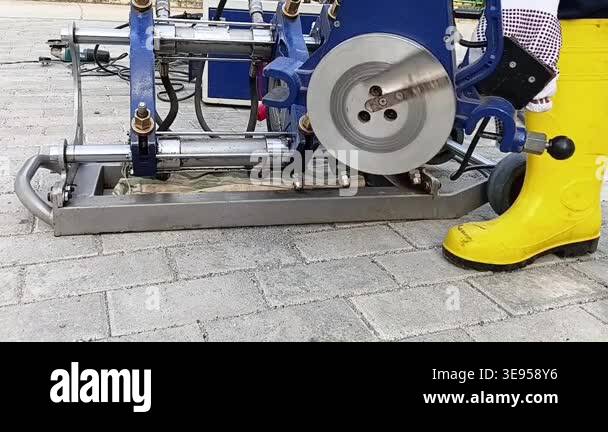 Close up of a spinning facing cutter tool on a hydraulic butt fusion ...