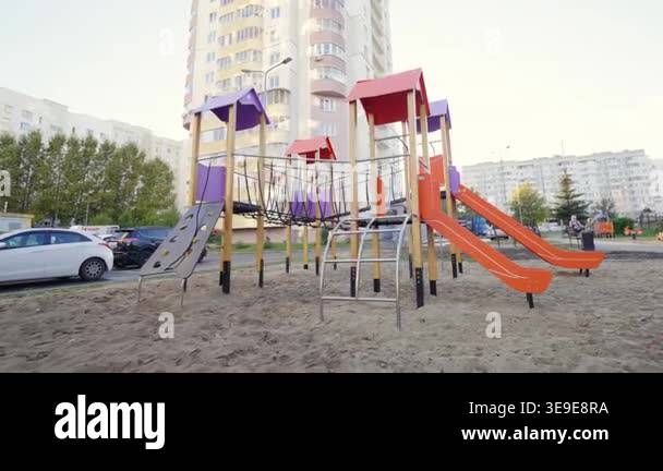 Colorful children maze with slides ladders and ropes on playground ...