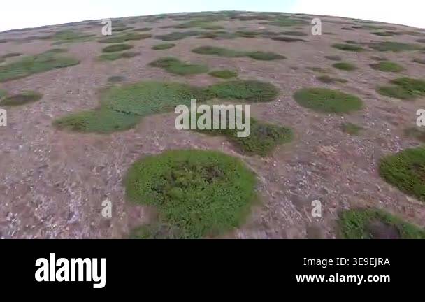 hilltop cinematic countryside geology topography rounded hill top down ...