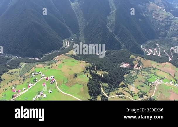 Aerial drone view of Petran plateau mountain village houses on green ...