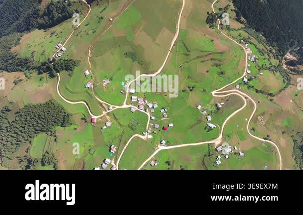 Aerial drone view of Petran plateau mountain village houses on green ...