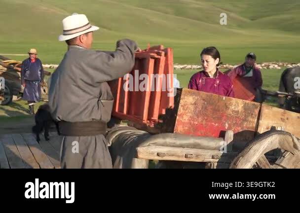 Mongolian families prepare carts and household goods for migration on ...