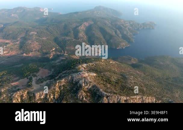 Aerial view shows forested Chile coastline where indented shores meet ...
