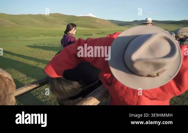Mongolian families prepare carts and household goods for migration on ...