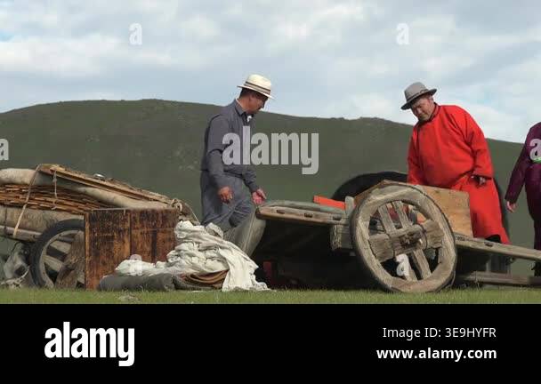 Mongolian families prepare carts and household goods for migration on ...