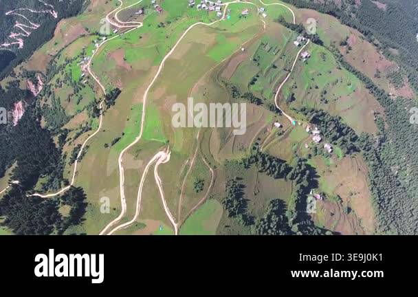 Aerial drone view of Petran plateau mountain village houses on green ...