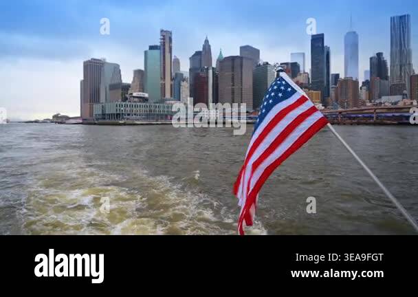American flag waving with Lower Manhattan skyline background. United ...