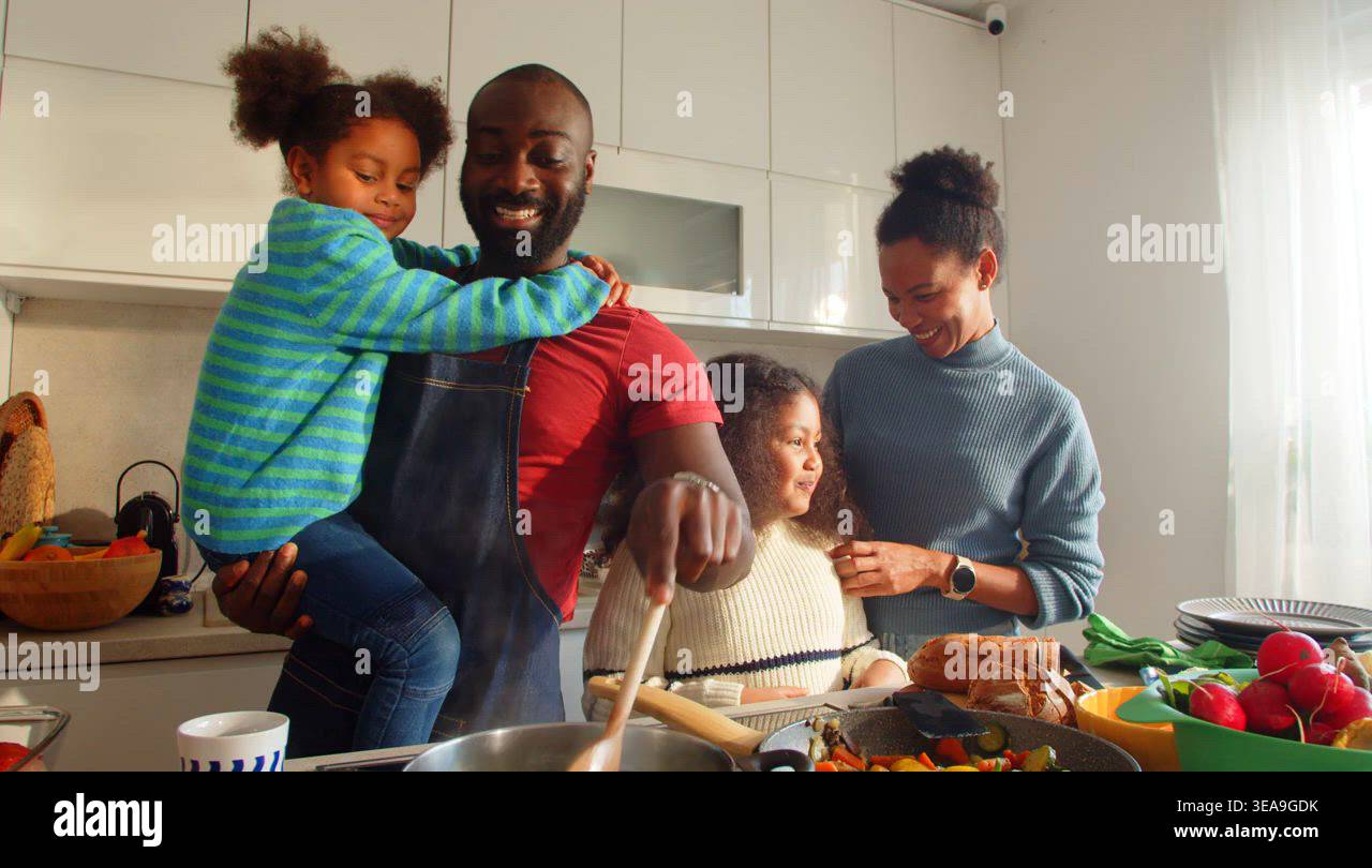 Family Cooking Together in a Modern Kitchen With Children Stock Video ...