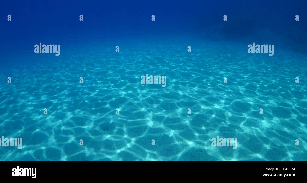sun reflection on sand underwater Stock Video Footage - Alamy