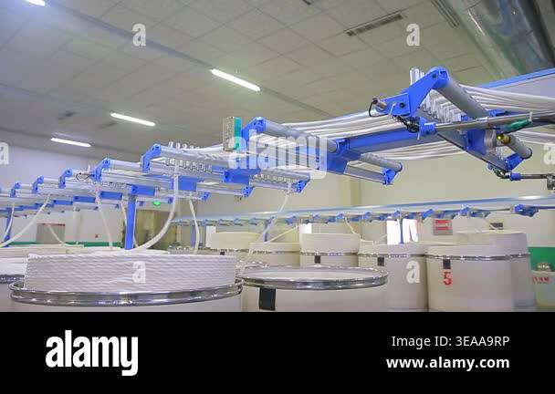 Cotton group in spinning production line factory, rotating mechanical ...